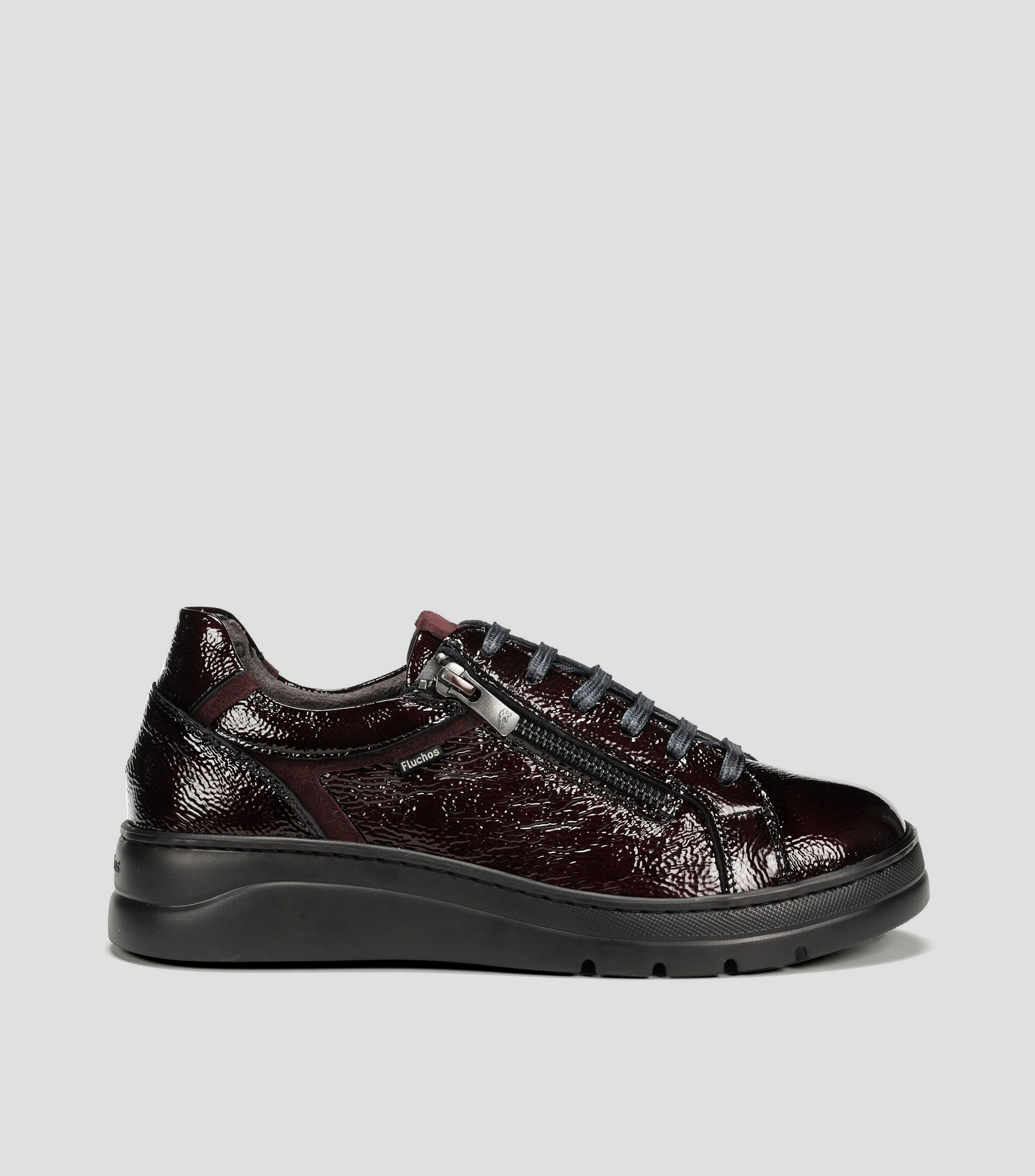 Fluchos: Tenis casuales Pompas en piel Mujer | El Palacio de Hierro