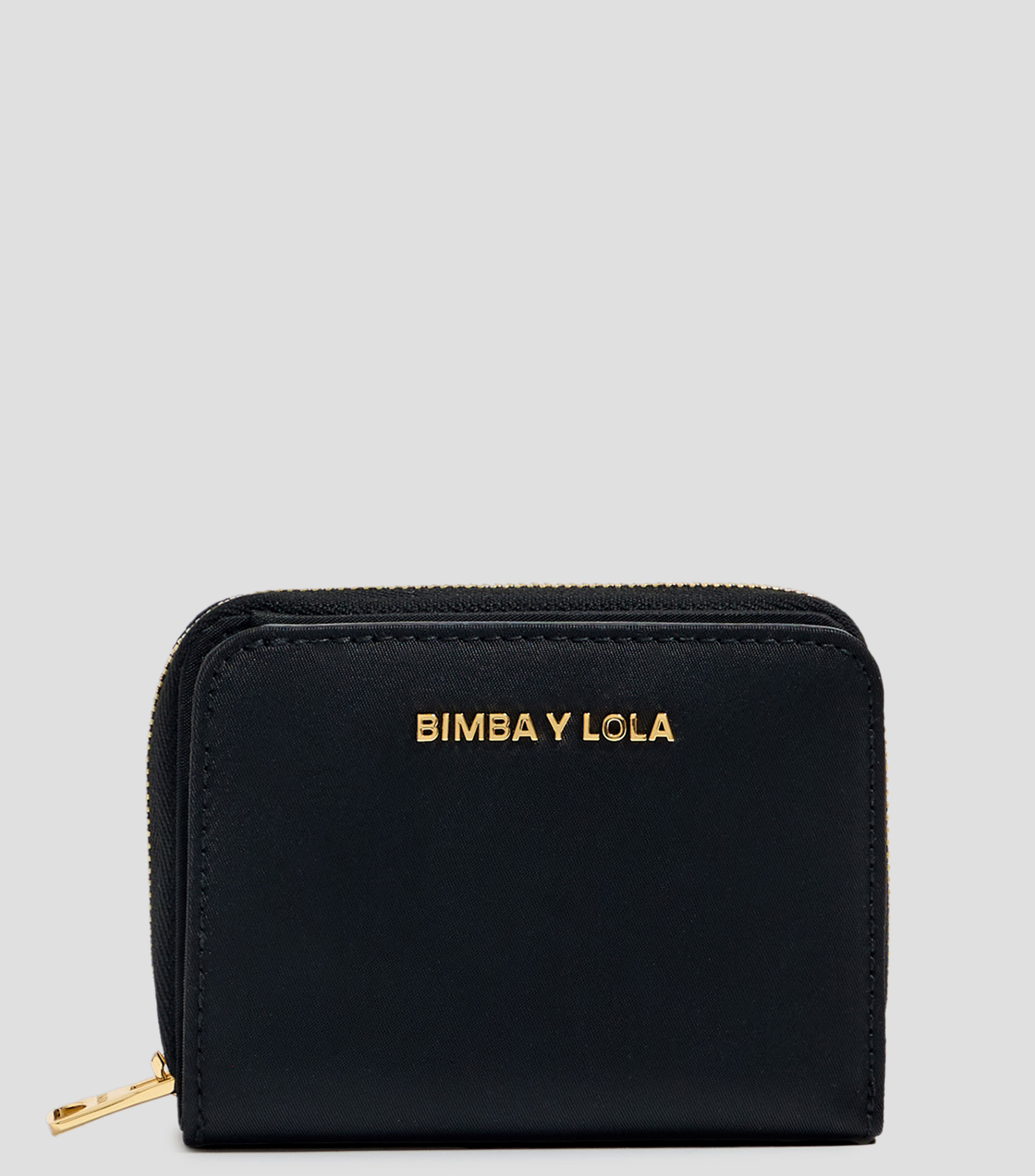 Bimba y Lola: Cartera solapa nylon negra Mujer | El Palacio de Hierro
