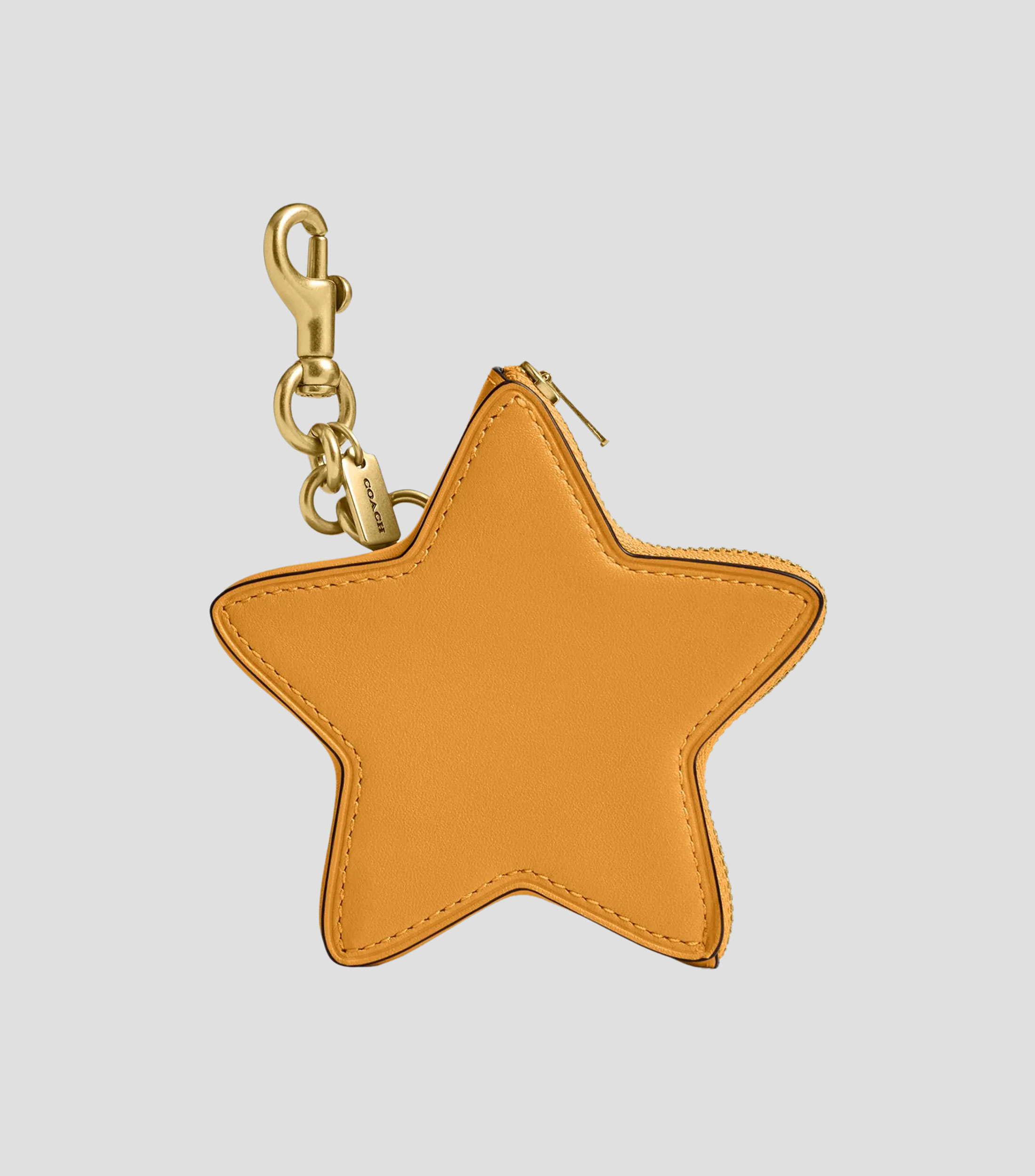 Coach Monedero Star en piel amarillo Mujer |El Palacio de Hierro