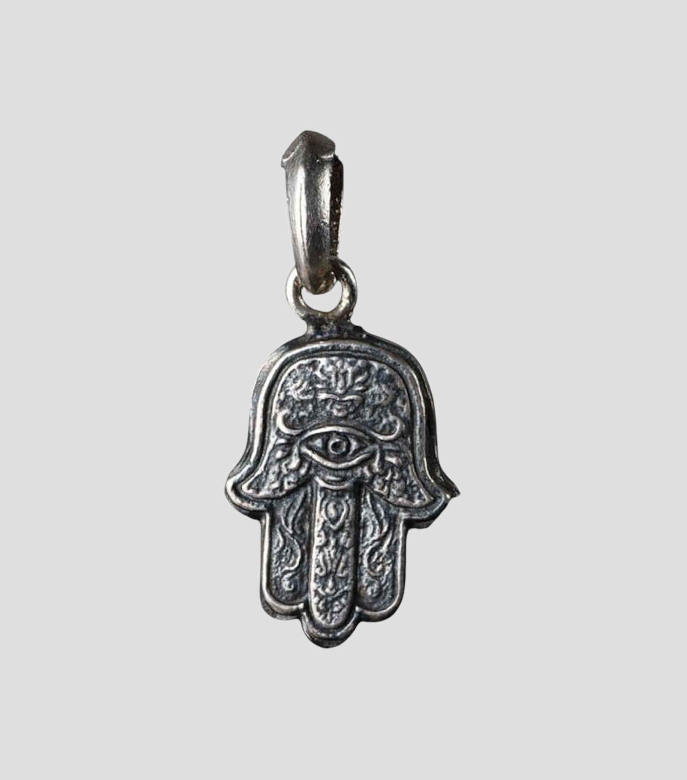 Rock & Jewel Dije Mano Hamsa en plata Unisex |El Palacio de Hierro