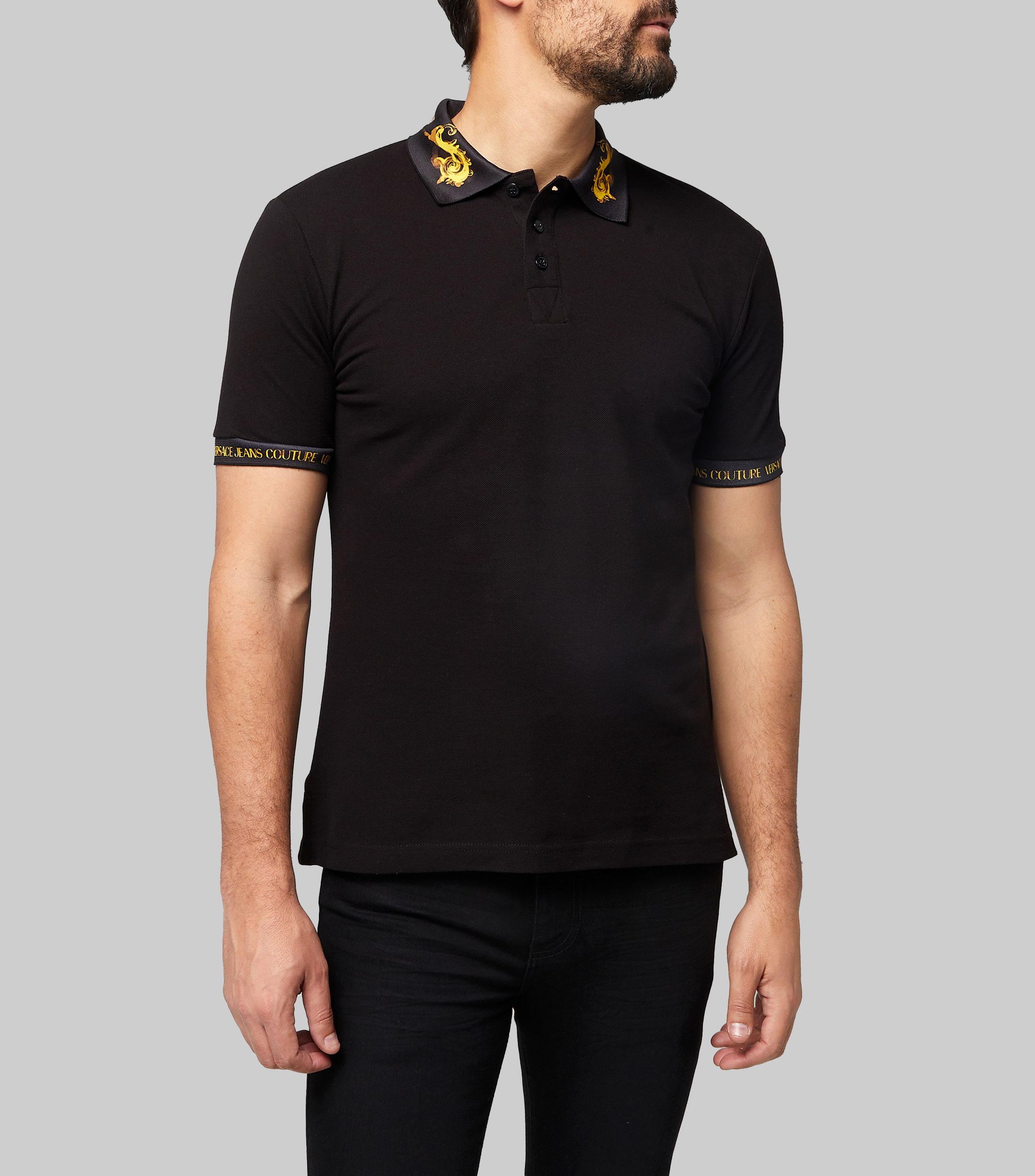 Versace Jeans Couture: Playera tipo polo lisa Hombre | El Palacio de Hierro