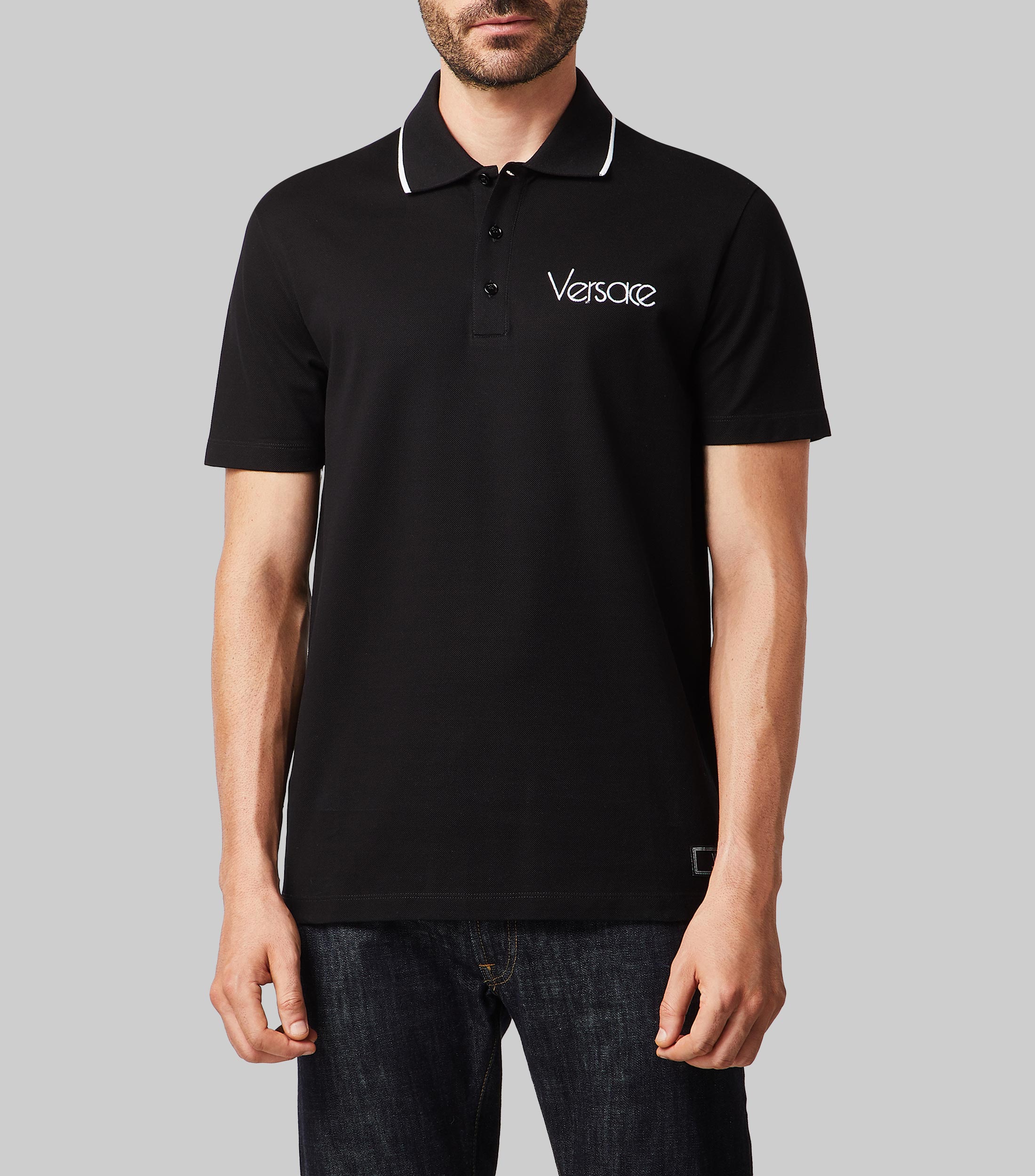 Versace: Playera tipo polo con manga corta Hombre | El Palacio de Hierro