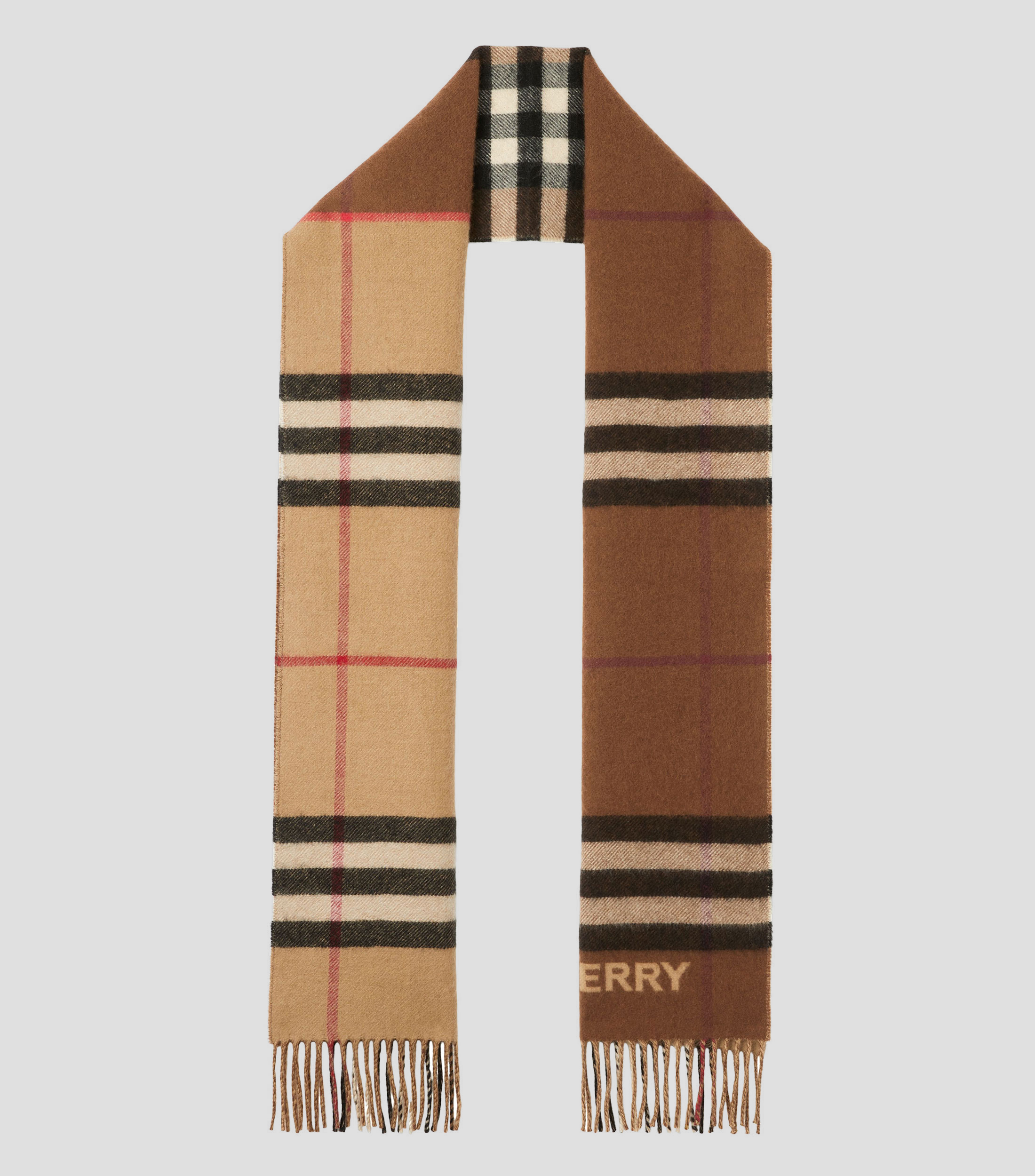 Burberry: Bufanda con cuadros Unisex | El Palacio de Hierro