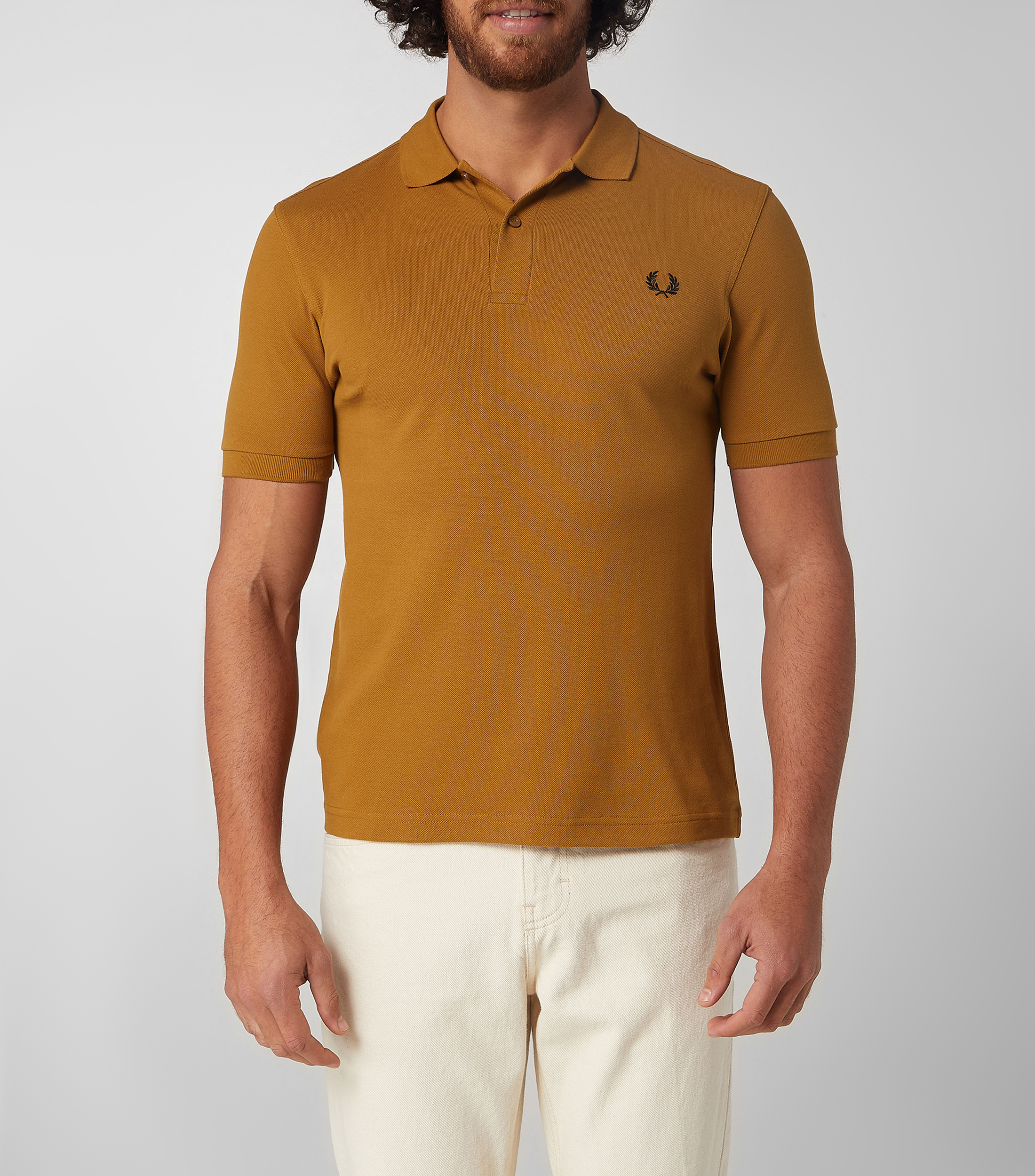 Fred Perry: Playera tipo Polo de manga corta Hombre | El Palacio de Hierro