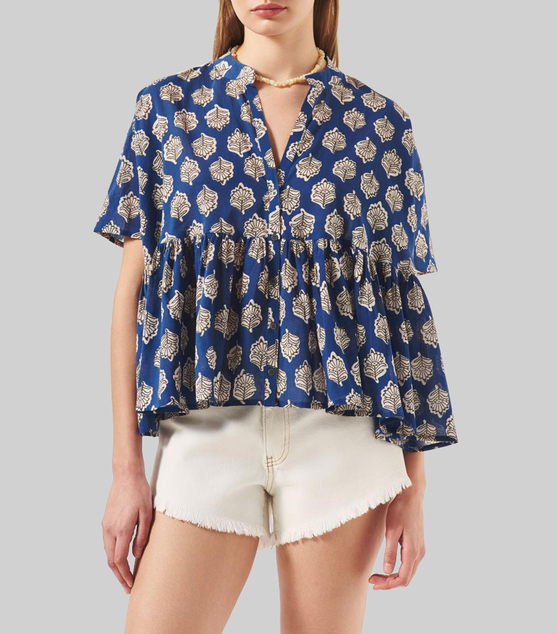Rapsodia: Blusa con estampado manga corta Mujer | El Palacio de Hierro